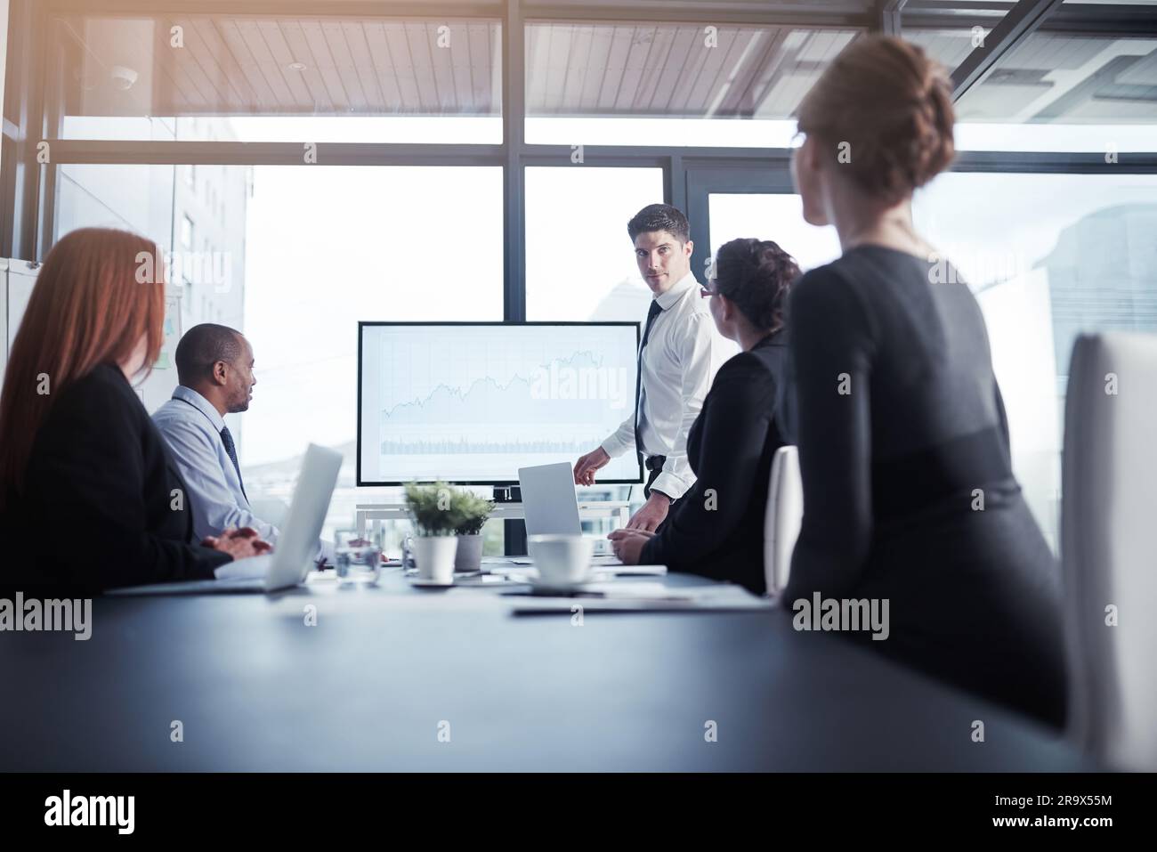 Monitor, businessman or leader in a presentation for graphs report or ...