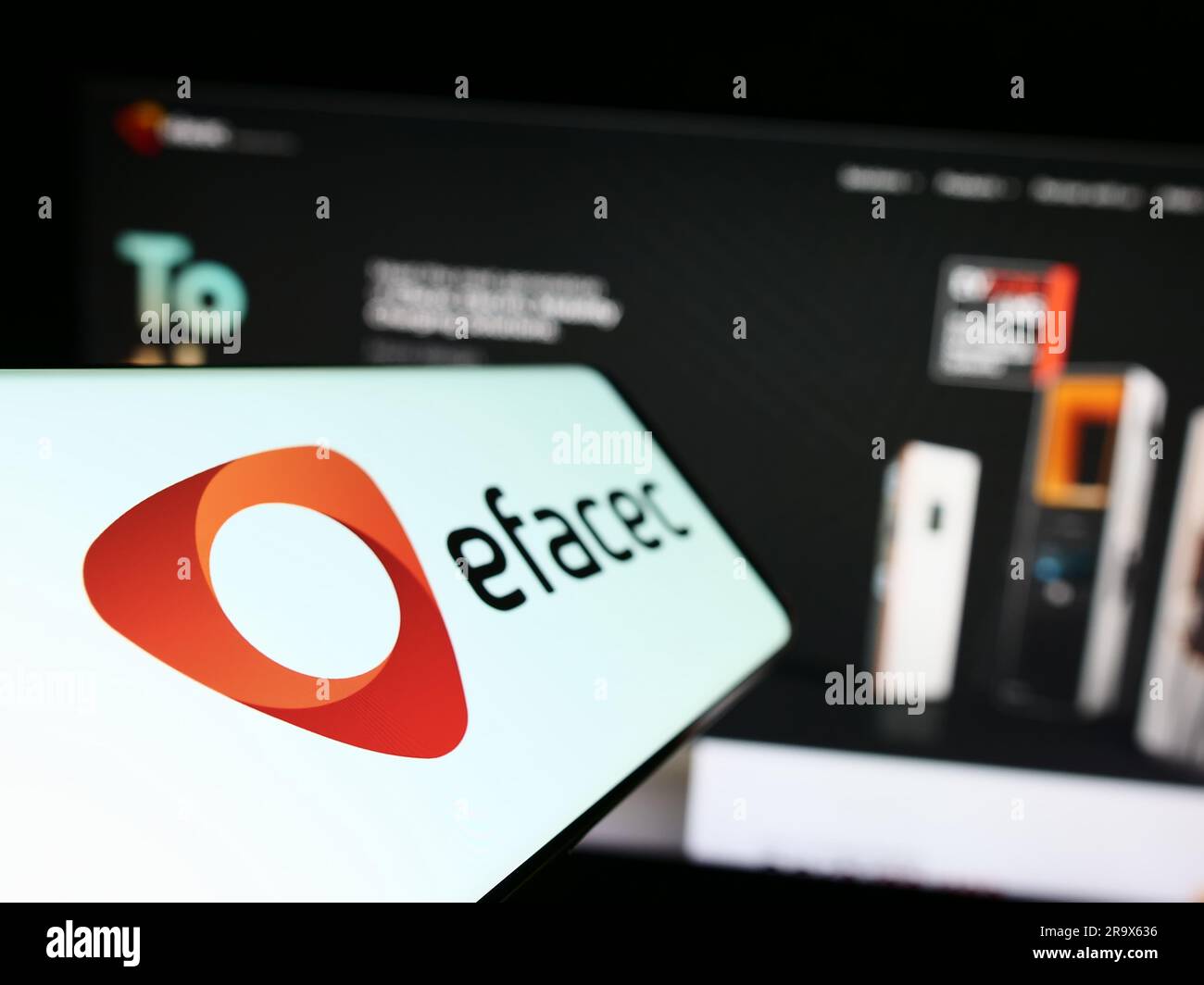 Mobile phone with logo of energy company EFACEC Power Solutions SGPS S ...