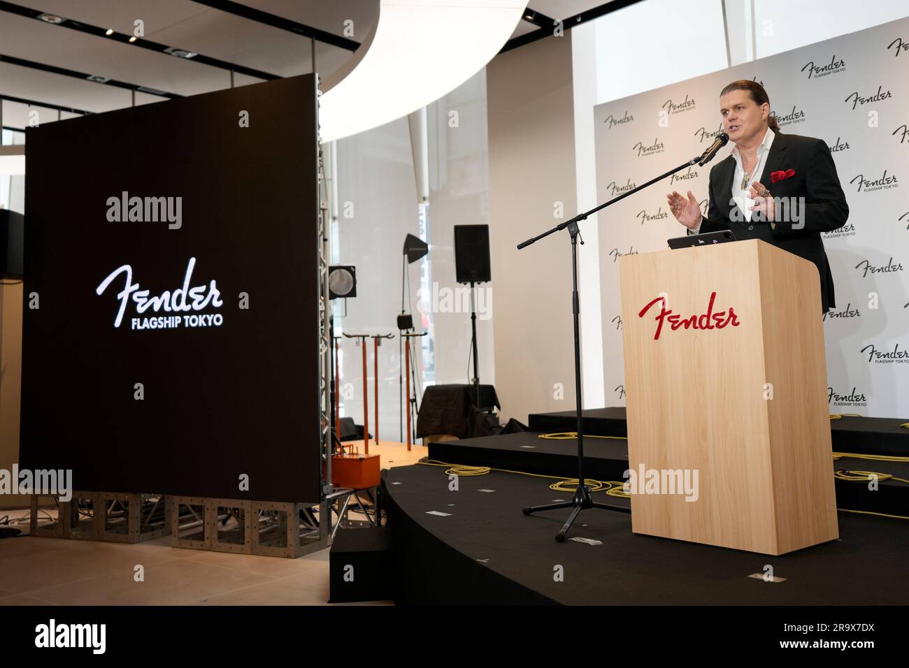 Fender President for Asia-Pacific Edward Cole speaks during the opening ...