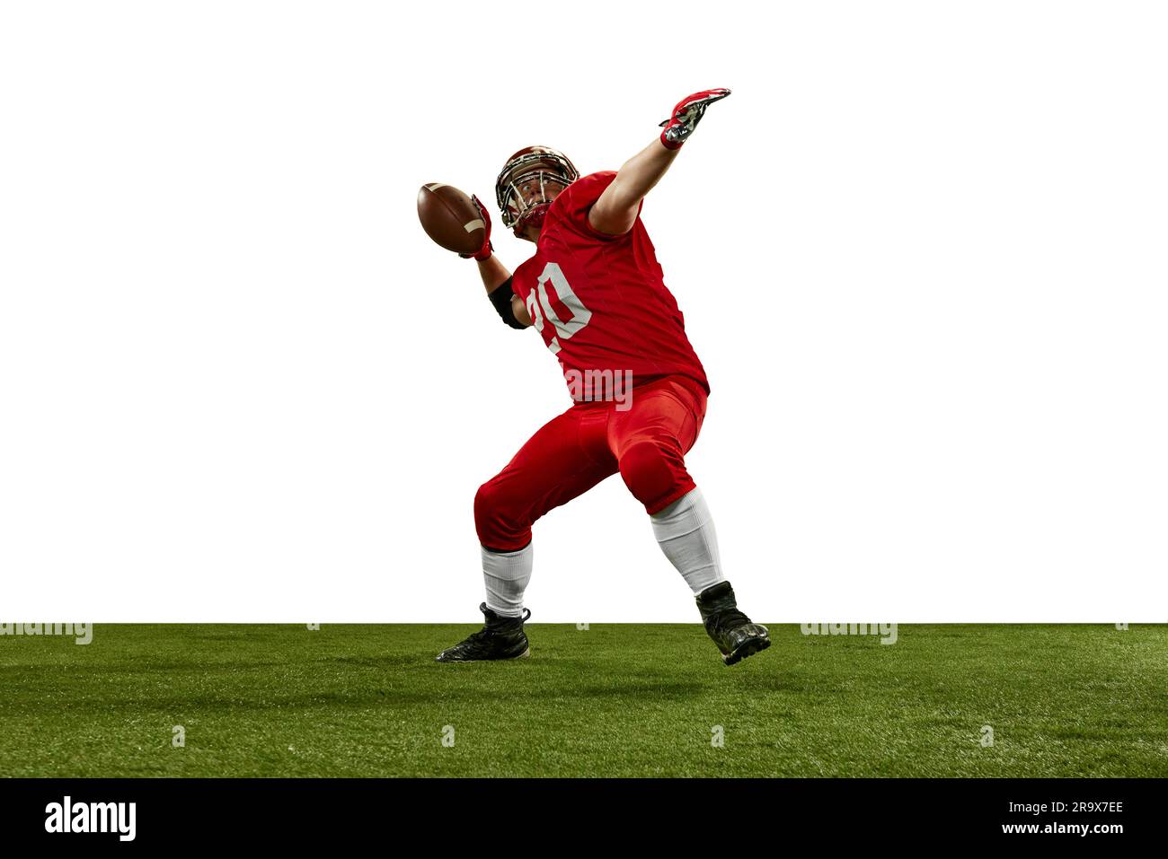 Man in red uniform and helmet, american football player in motion ...