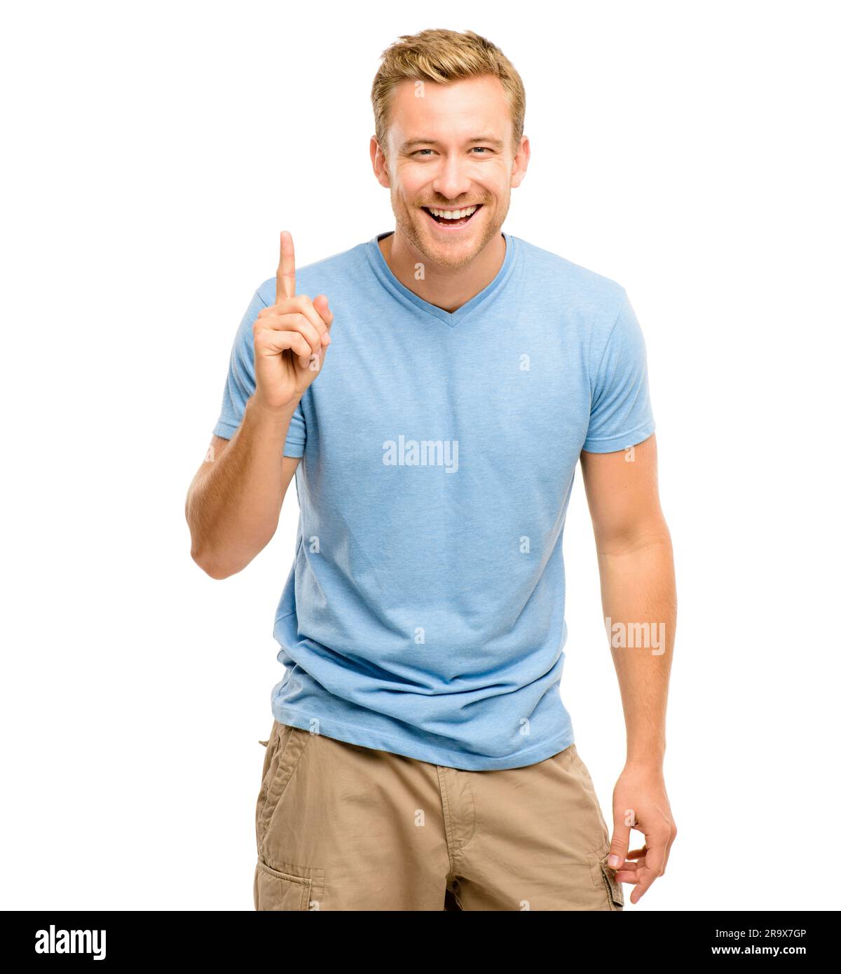 Happy, pointing up and portrait of a man in studio for announcement ...