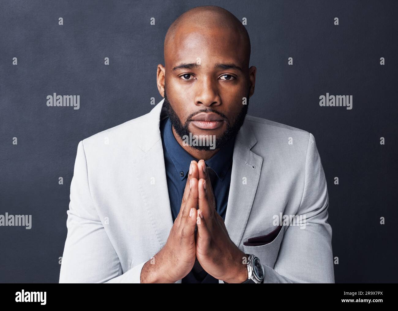 Businessman hands together in prayer hi-res stock photography and ...