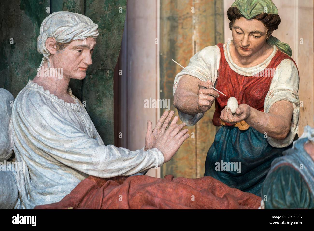 Saint Anne, Mother of Mary, has an egg pierced by a wet nurse after the ...