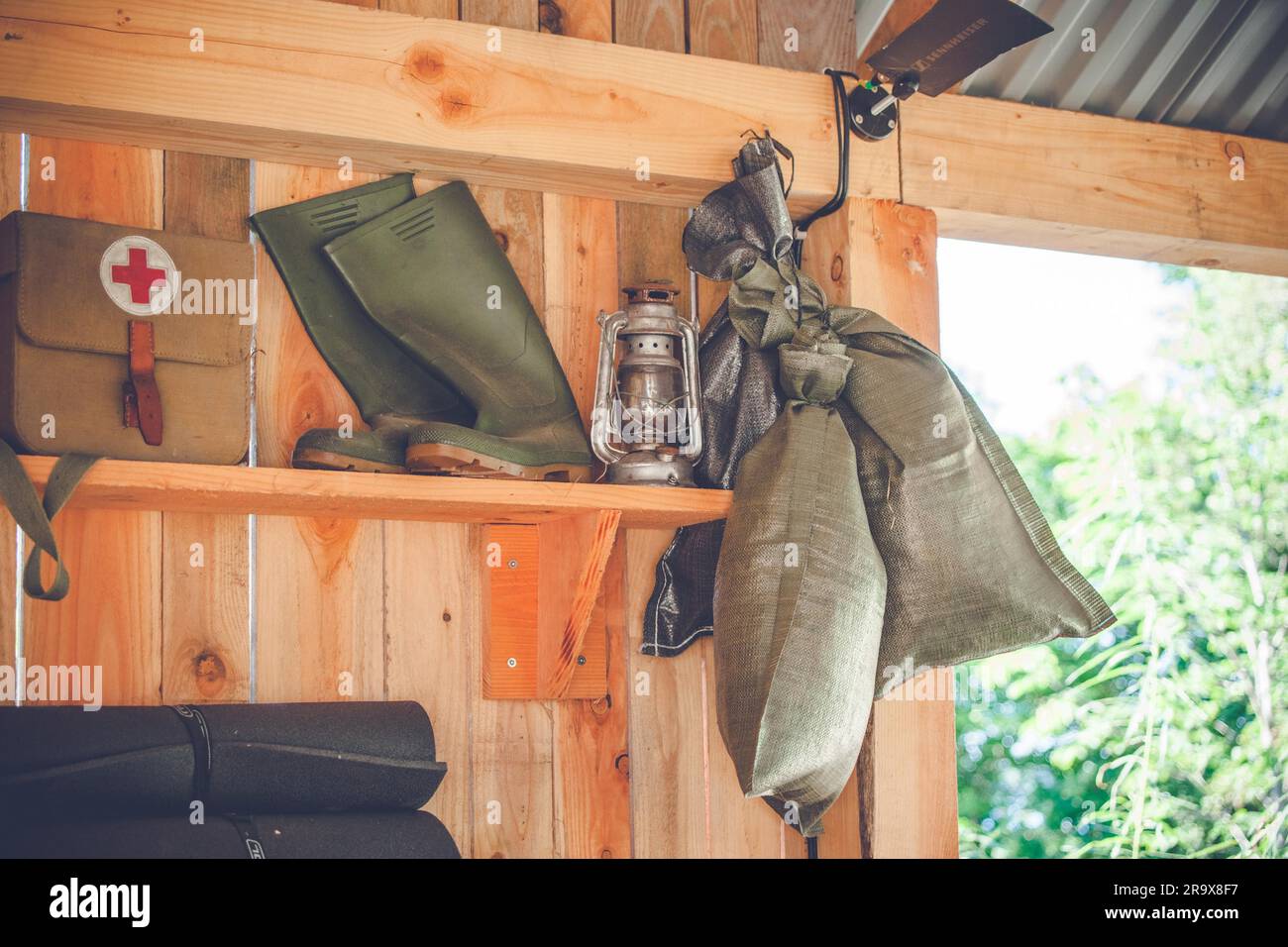 Retro survival kit in a wooden cabin in the nature Stock Photo - Alamy