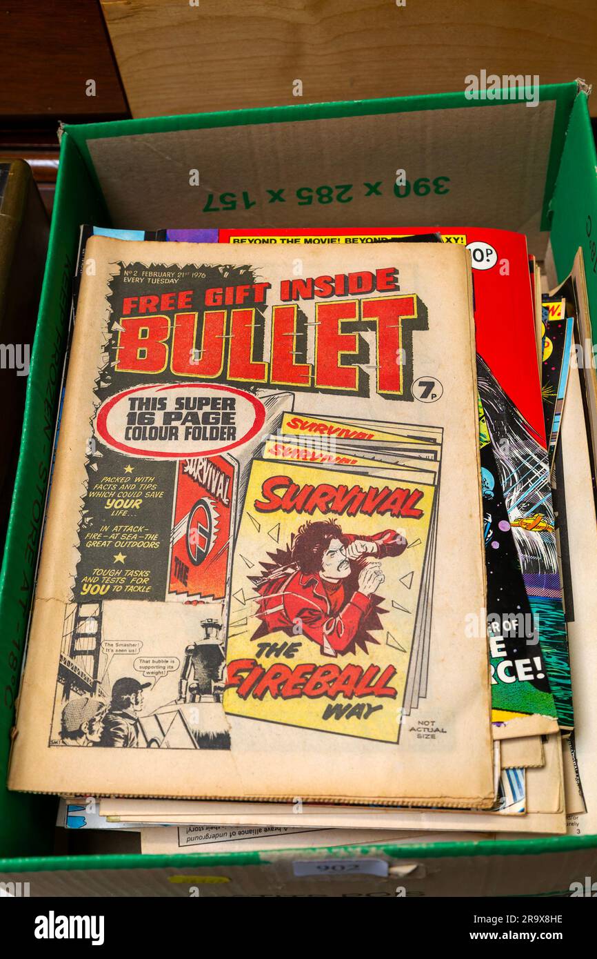 Box of Bullet comics on display in auction room, UK Stock Photo - Alamy