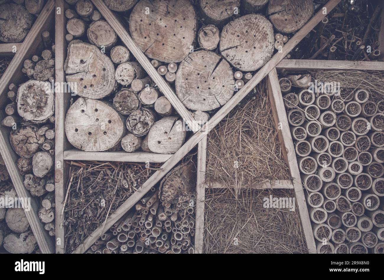 Abstract background with wood logs on a shelf with hay Stock Photo - Alamy
