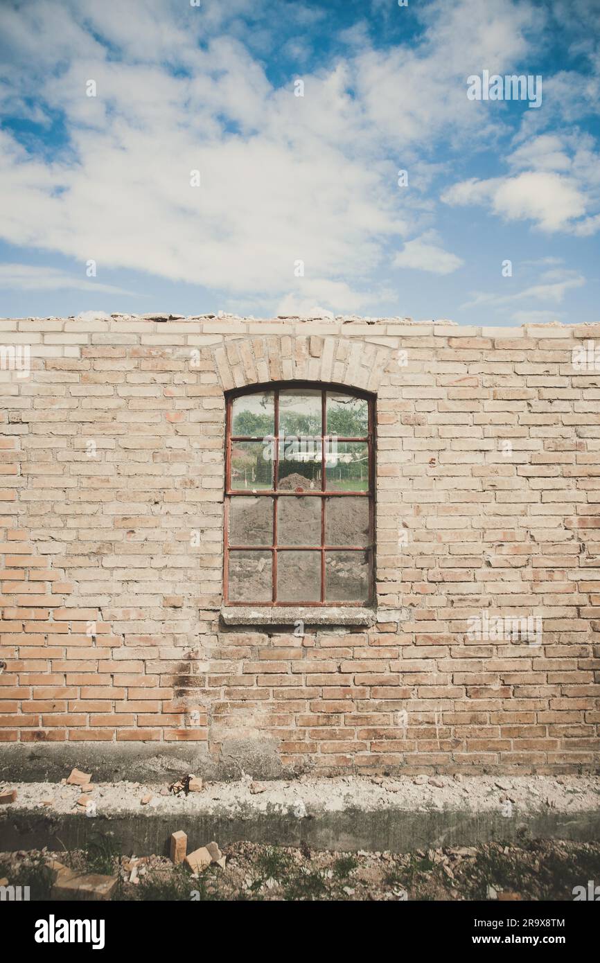 Old window on a wall in a damaged building Stock Photo - Alamy