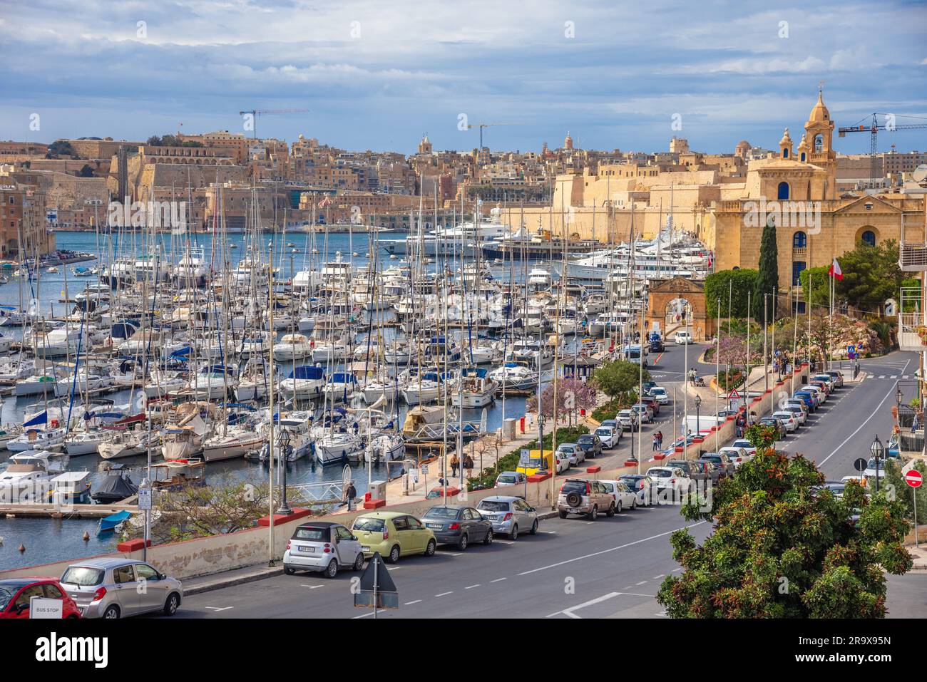 A view of old Mdina street with a traditional Maltese style openwork ...