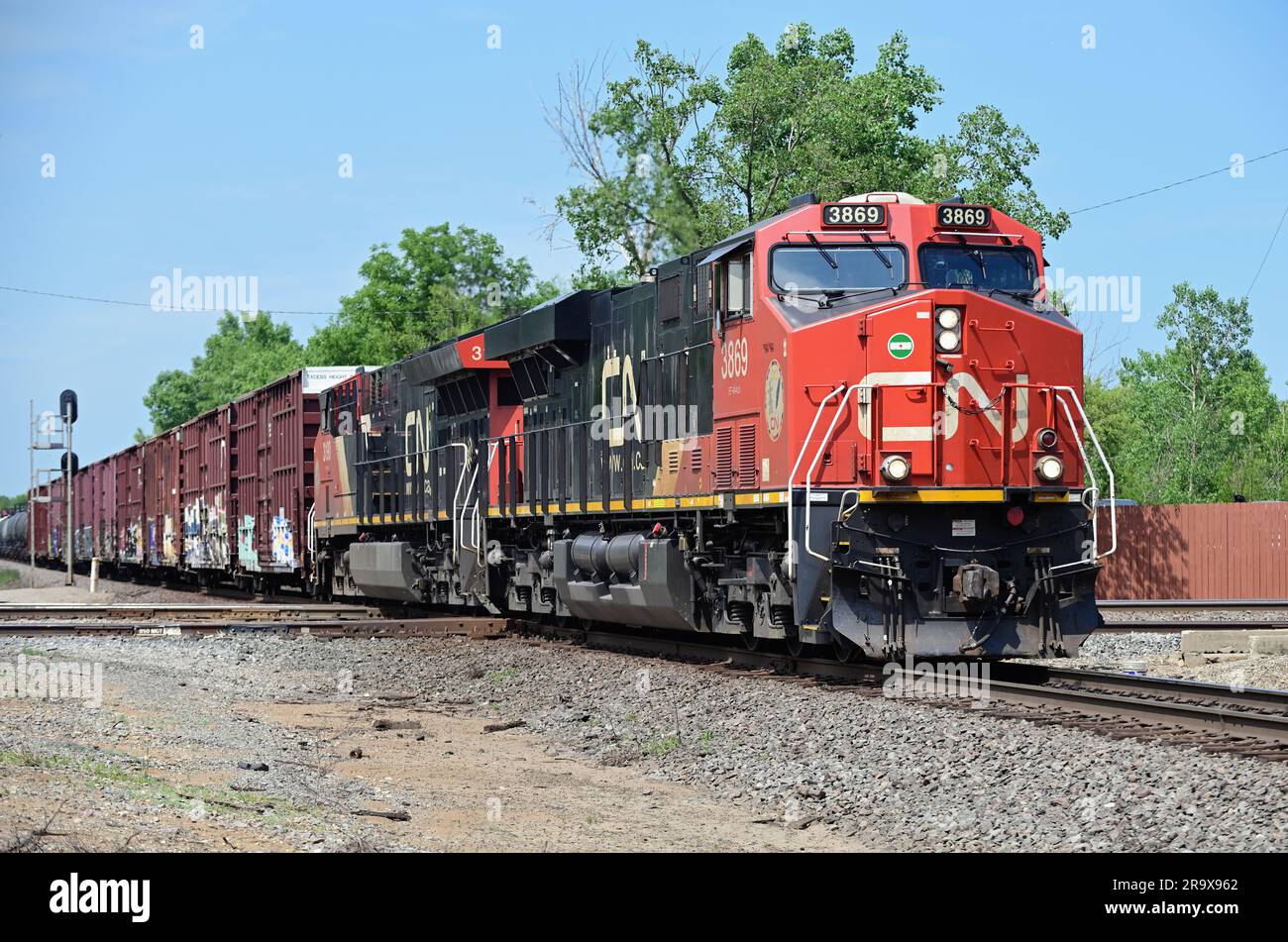 Elgin, Illinois, USA. A pair Canadian National Railway locomotives lead ...