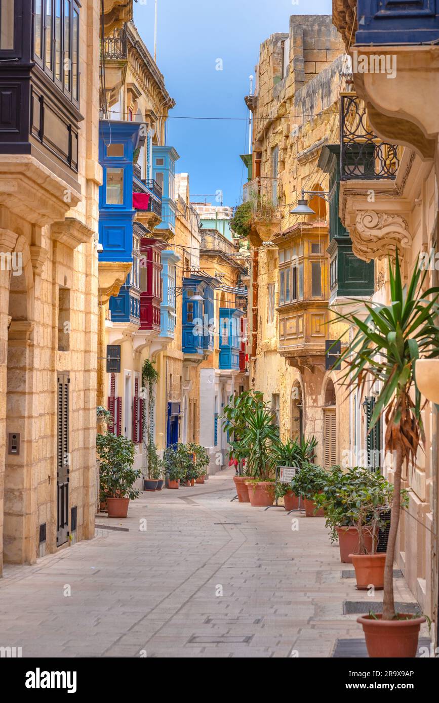A view of old Mdina street with a traditional Maltese style openwork ...