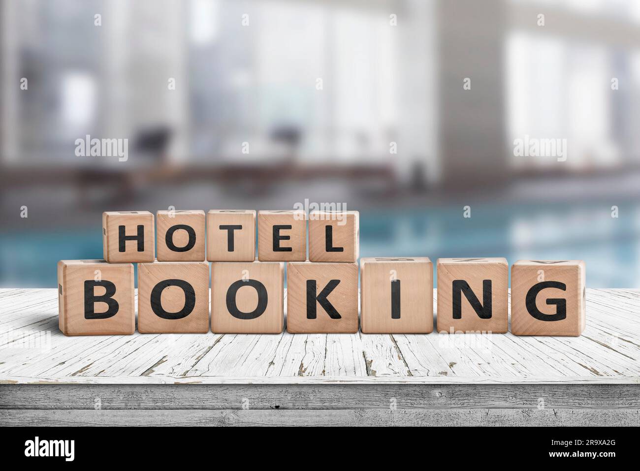 Hotel booking sign on a wooden step with blurry background of a ...