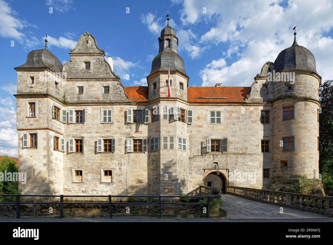 North-west side of Mitwitz moated castle with stone bridge and entrance ...