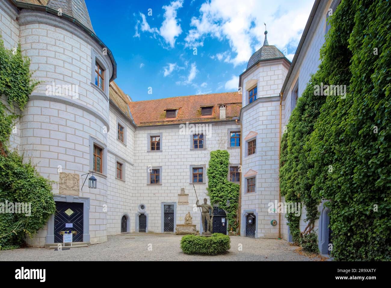 Inner courtyard of Mitwitz moated castle with Neptune fountain and ...