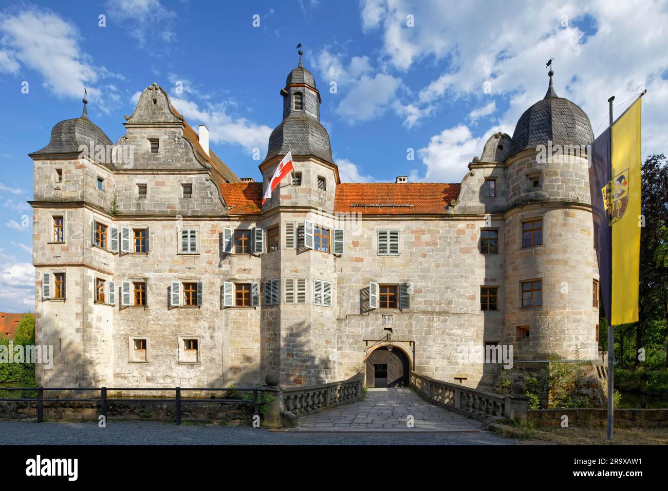 North-west side of Mitwitz moated castle with stone bridge and entrance ...