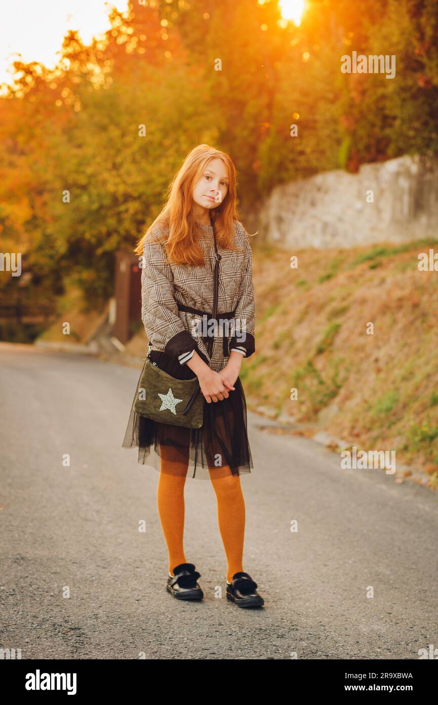 Portrait of beautiful young girl in the sunlight at sunset Stock Photo ...