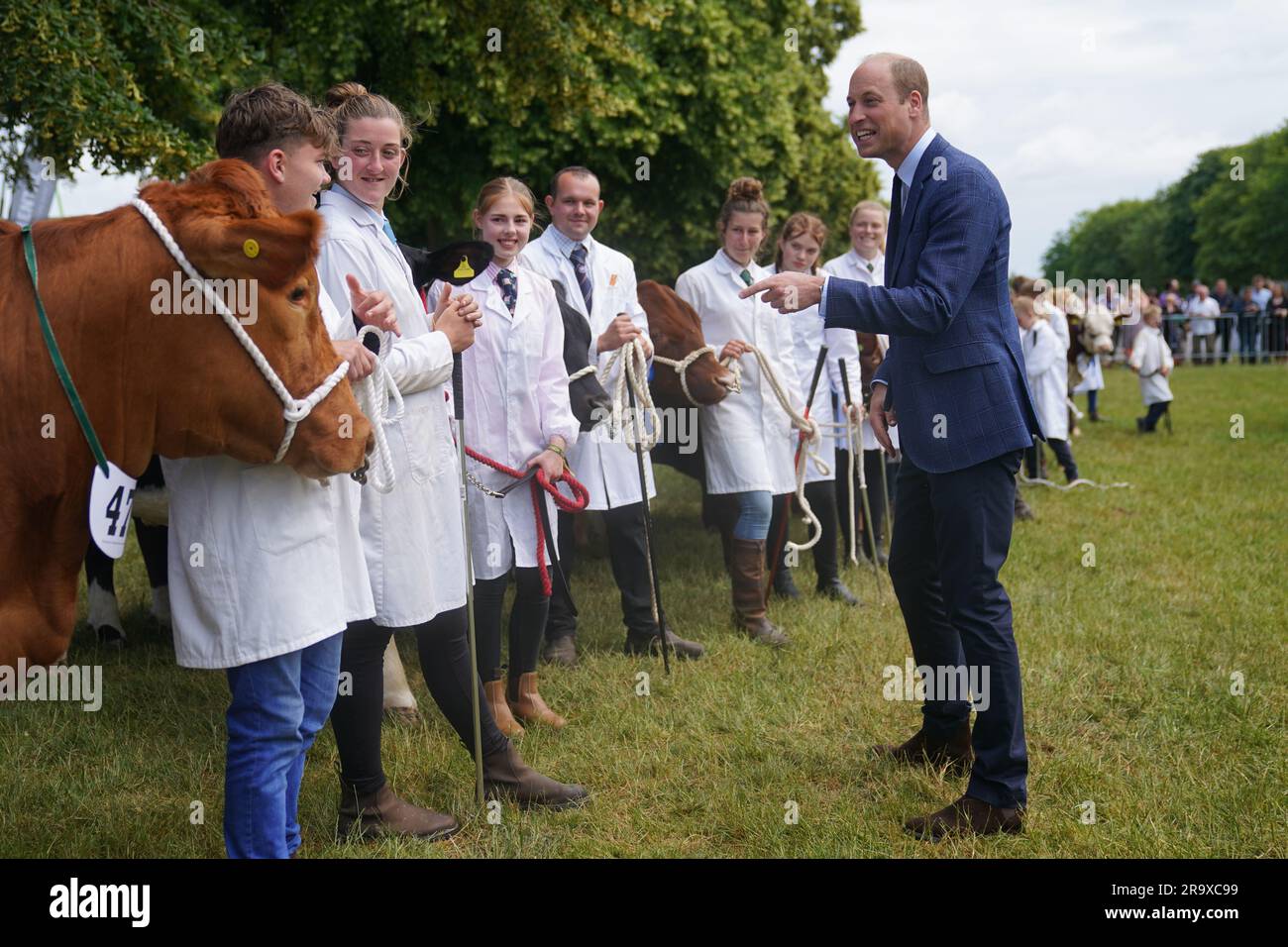 The Prince of Wales meet young cattle handlers during the Royal Norfolk ...