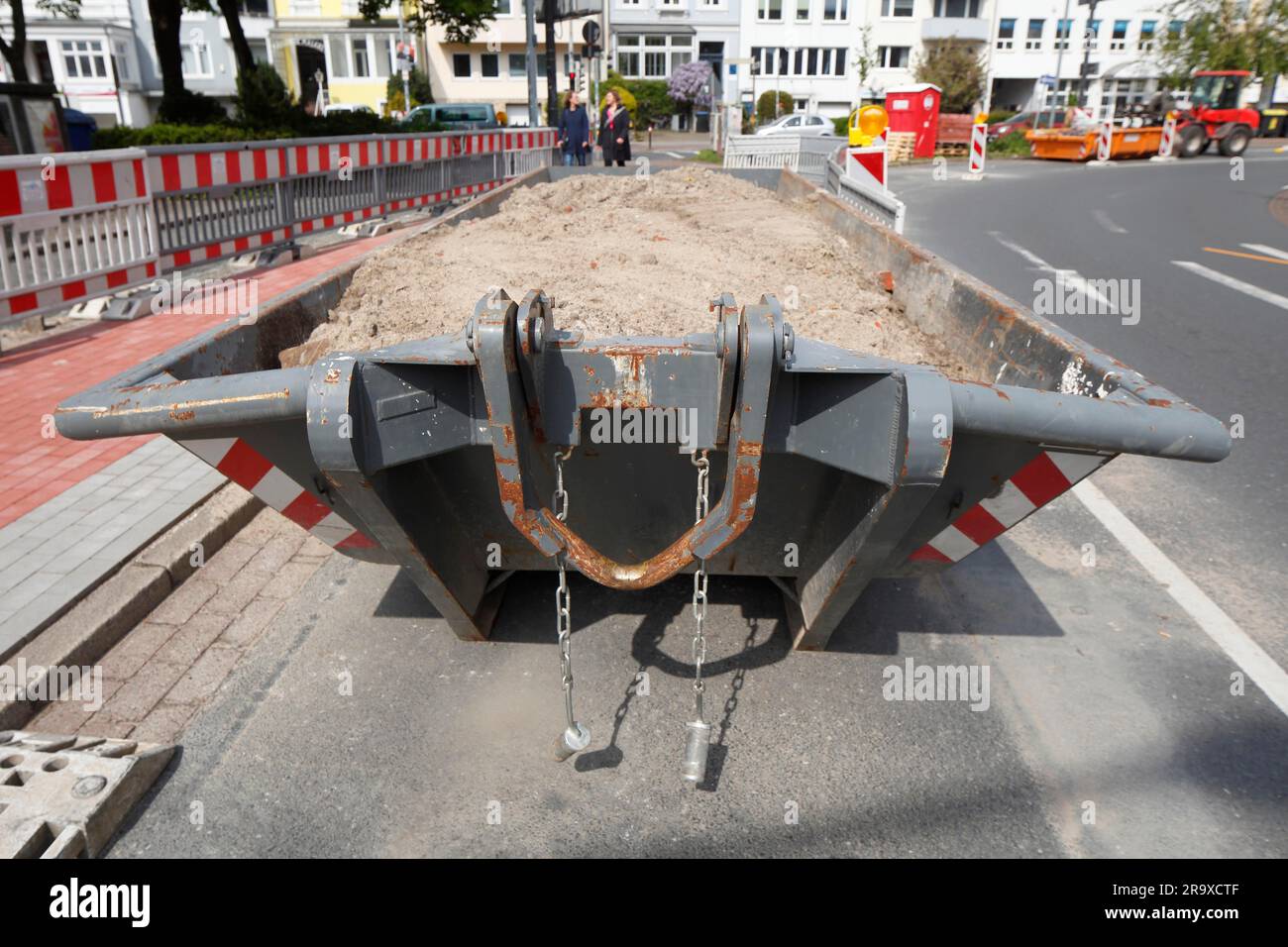 Container, skip for construction waste standing on the road ...