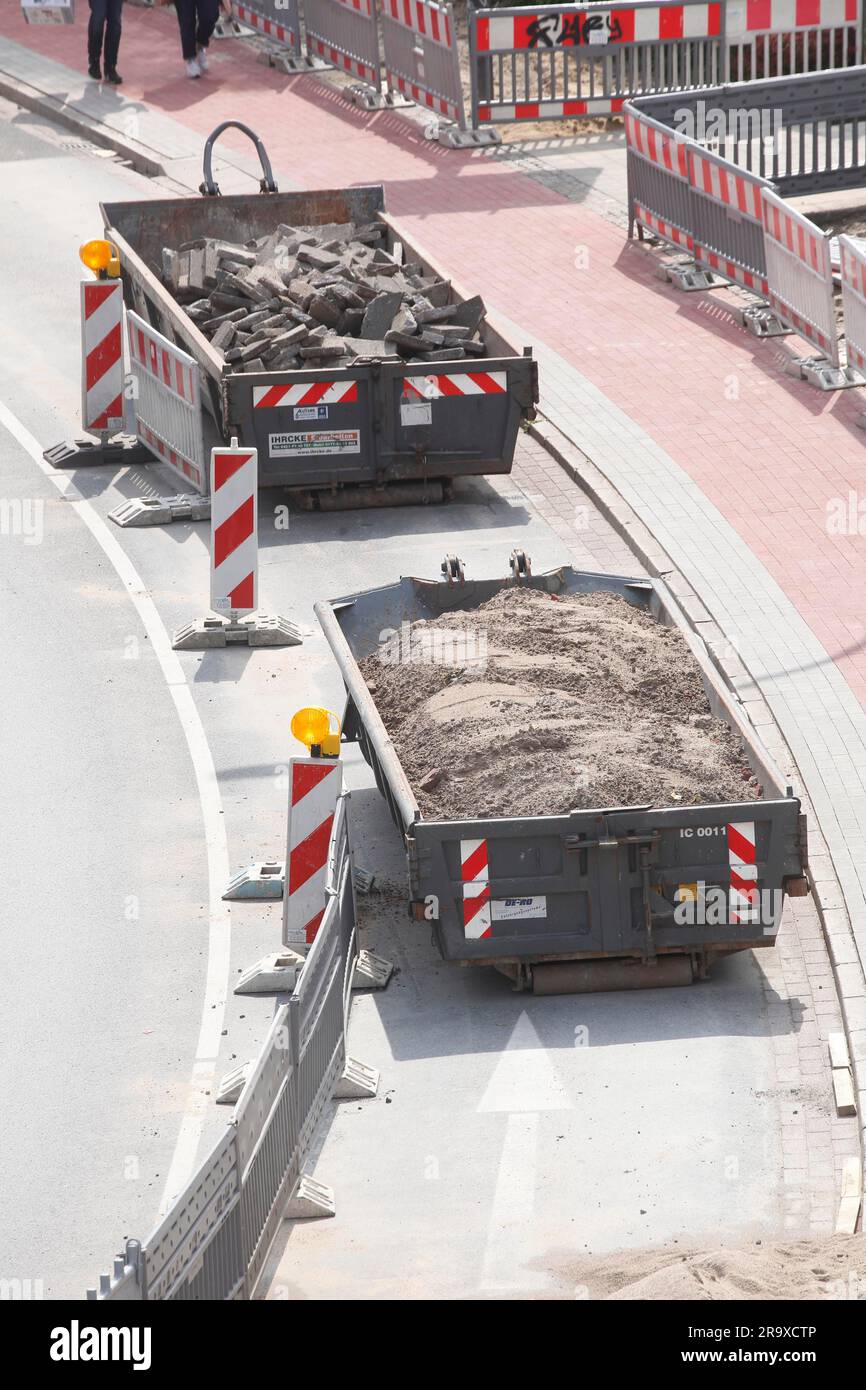 Container, skip for construction waste standing on the road ...