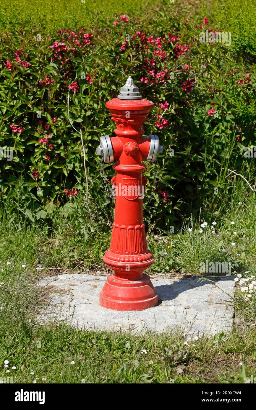Red hydrant, Germany Stock Photo - Alamy