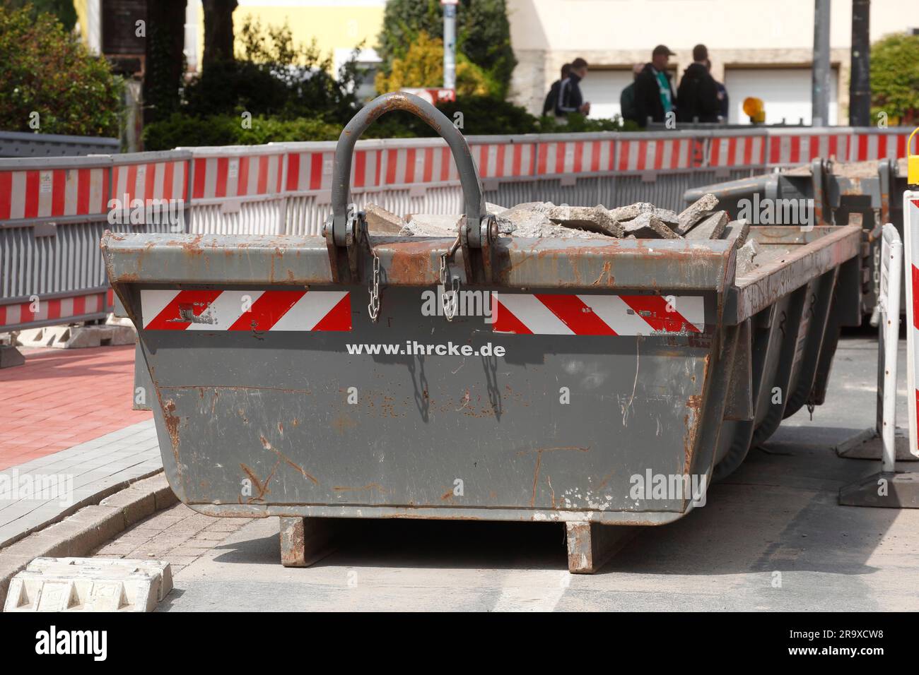 Container, skip for construction waste standing on the road ...