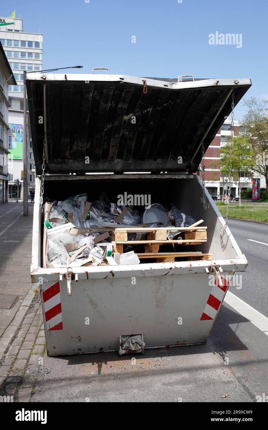 Container, skip for building rubble and bulky waste standing on the ...