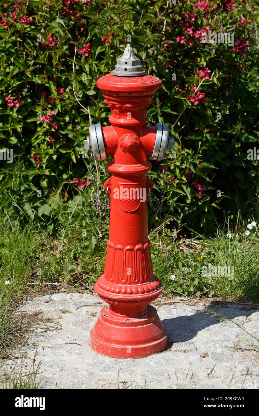 Red hydrant, Germany Stock Photo - Alamy
