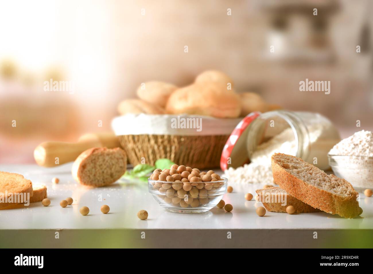 Freshly prepared soy alternative bread on white bench and rustic ...