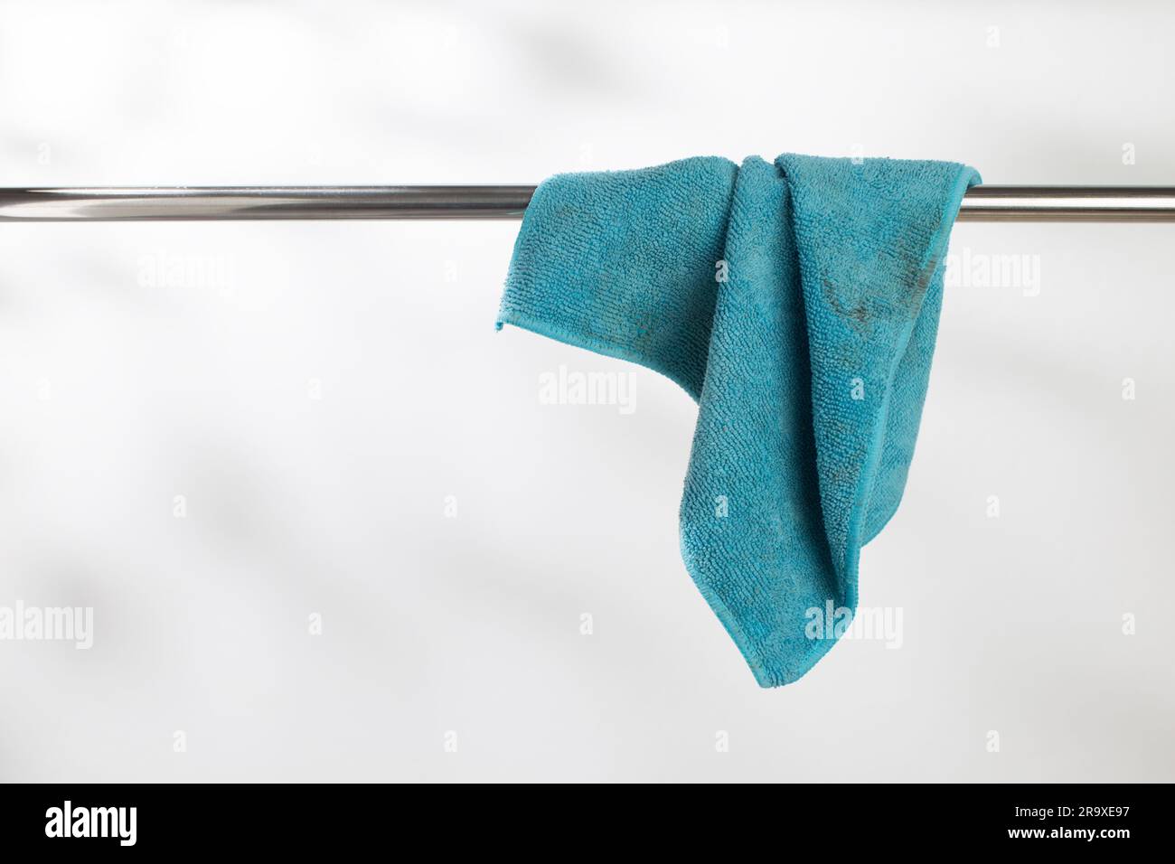 The dirty cloth with wrinkles hanging on the clothesline Stock Photo ...