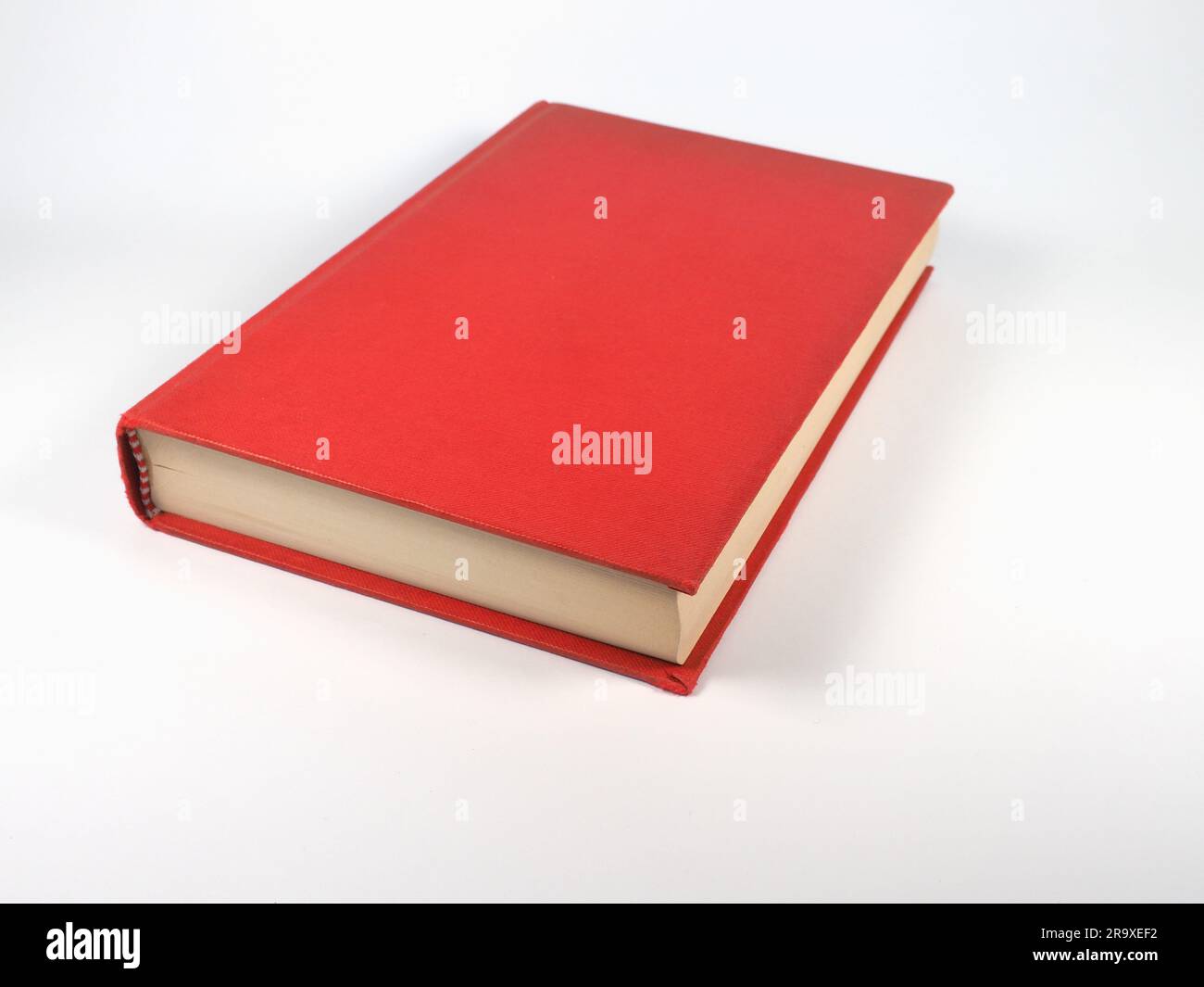 closed red book over off white background with copy space Stock Photo ...