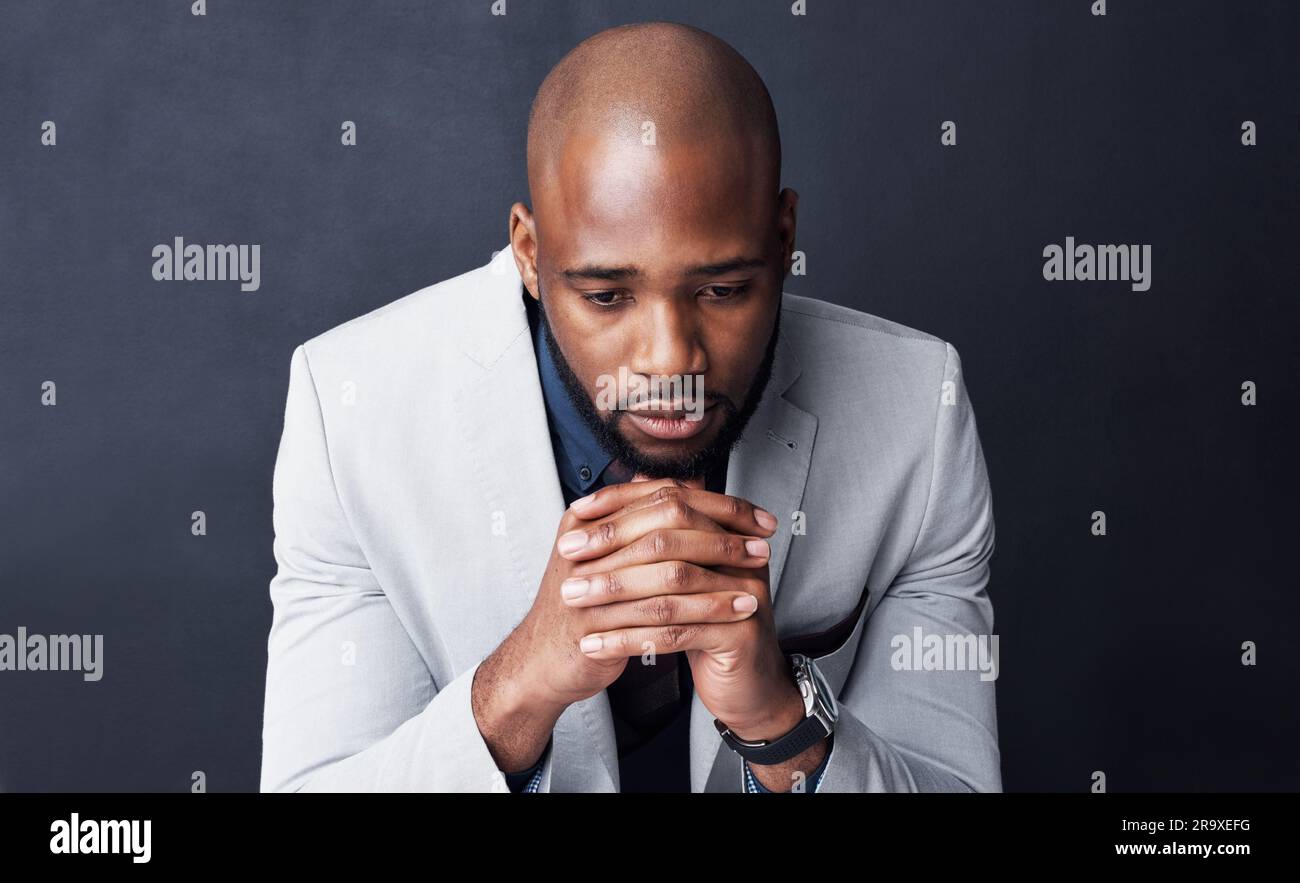 Praying, sign and business man sad for career, job or work opportunity ...
