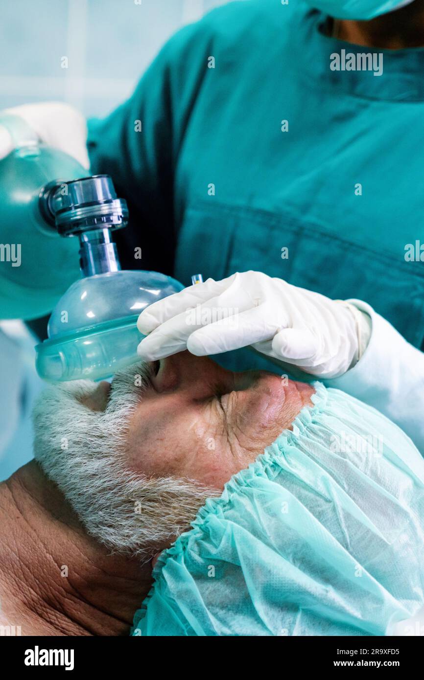 Anesthesiologist doctor anesthetized a surgical patient in hospital ...