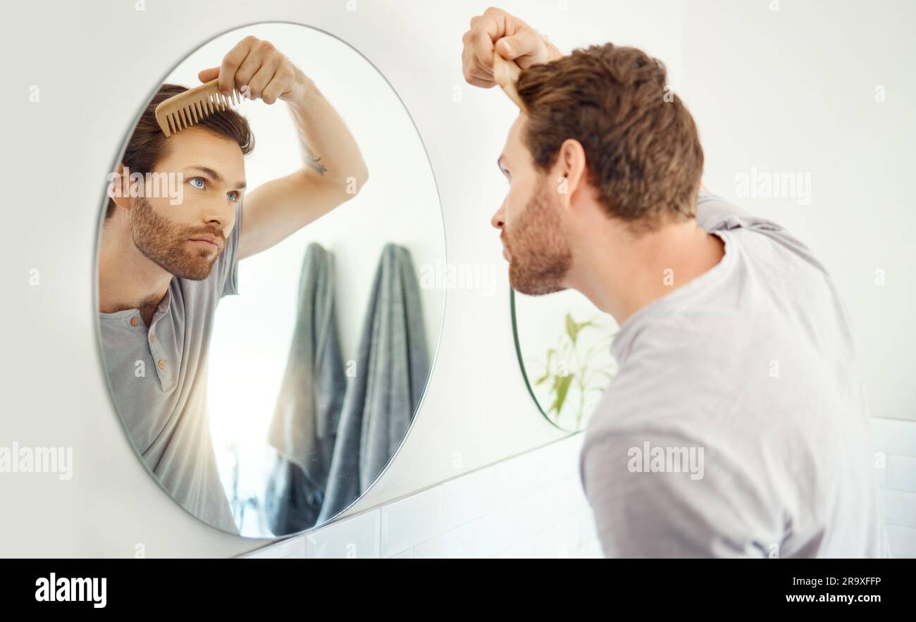 Bathroom, mirror and man brush hair for growth maintenance, texture ...