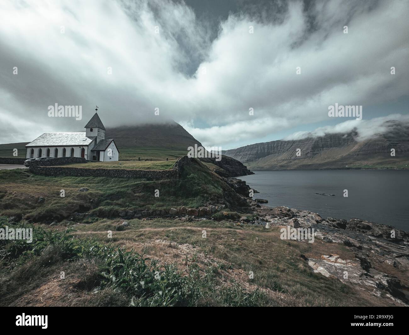 A breathtaking view of the stunning landscape of the Faroe Islands ...