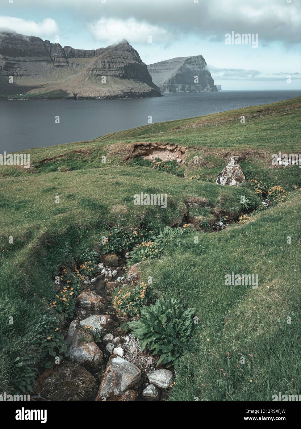 A breathtaking view of the stunning landscape of the Faroe Islands ...