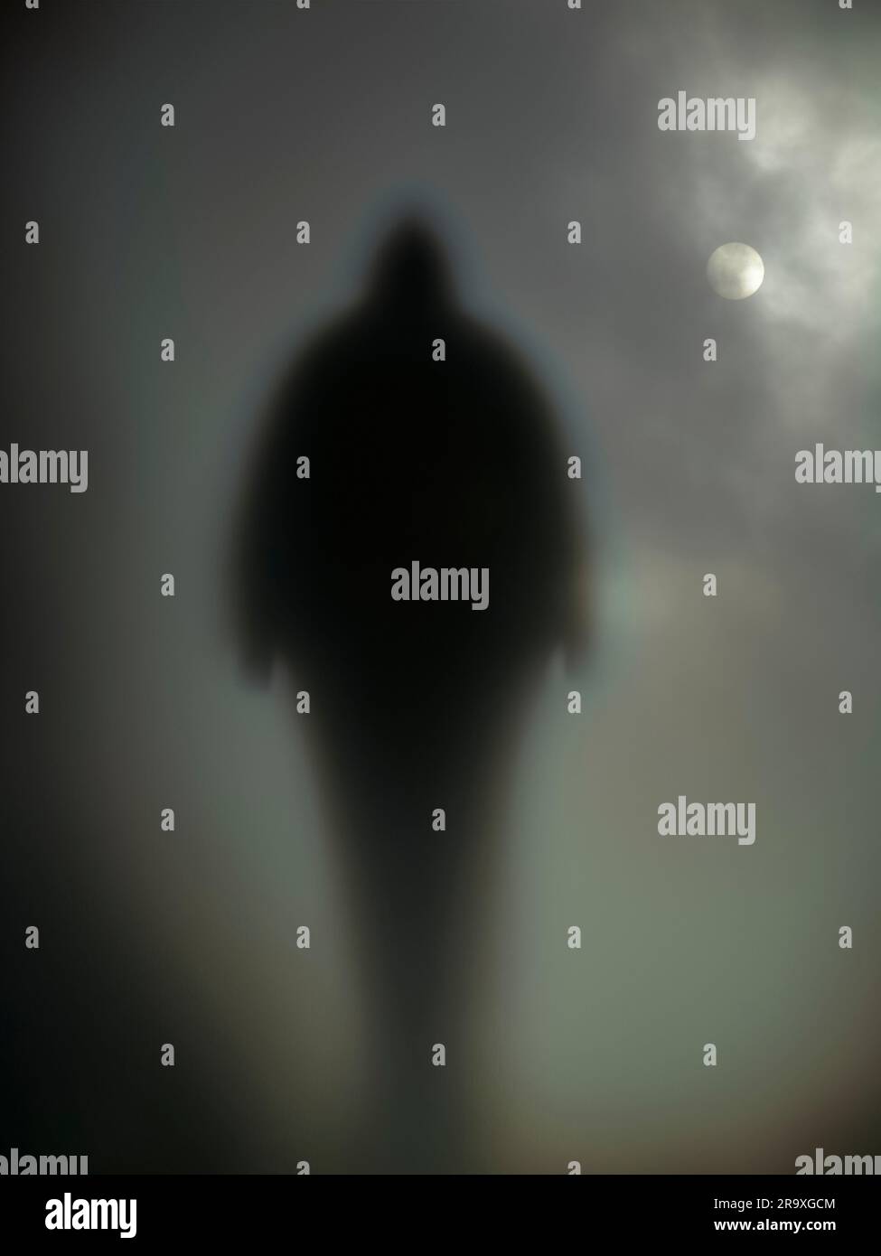 Dark entity in an overcast full moon night Stock Photo - Alamy