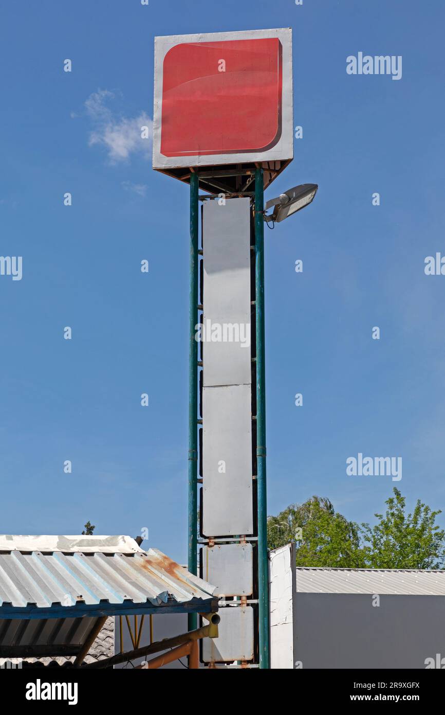 Tall Tower Commercial Advertisement Sign With Reflector Stock Photo - Alamy