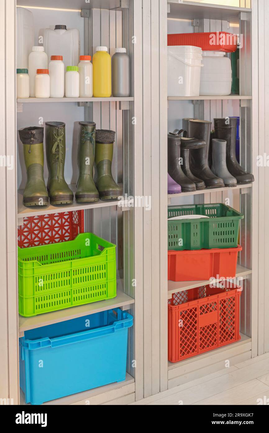 Plastic Bottles Rubber Boots Crates Boxes at Shelf Work Gear Equipment ...