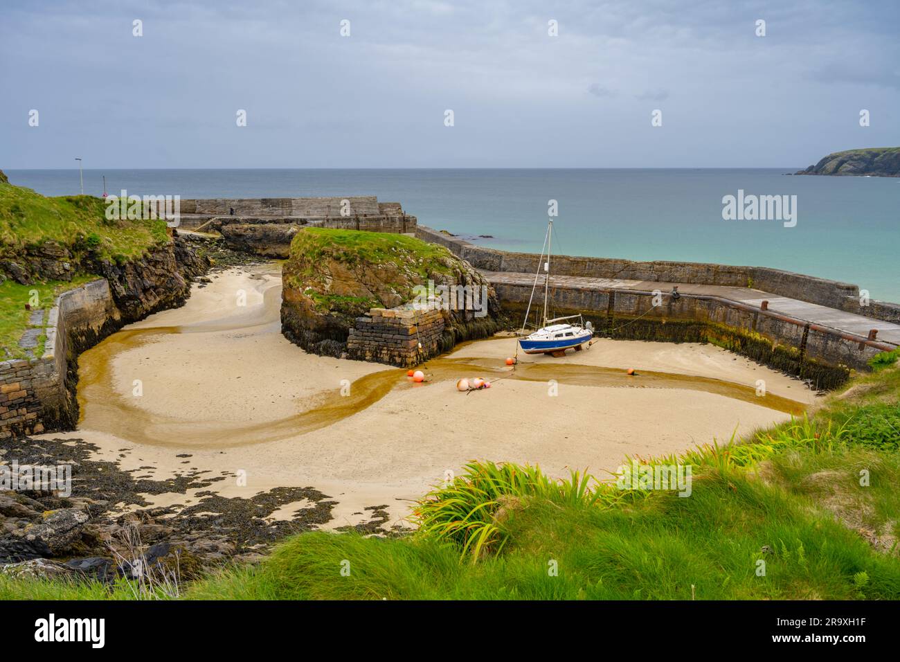 Looking down on the harbour at Port of Ness Isle of Lewis, Scotland ...