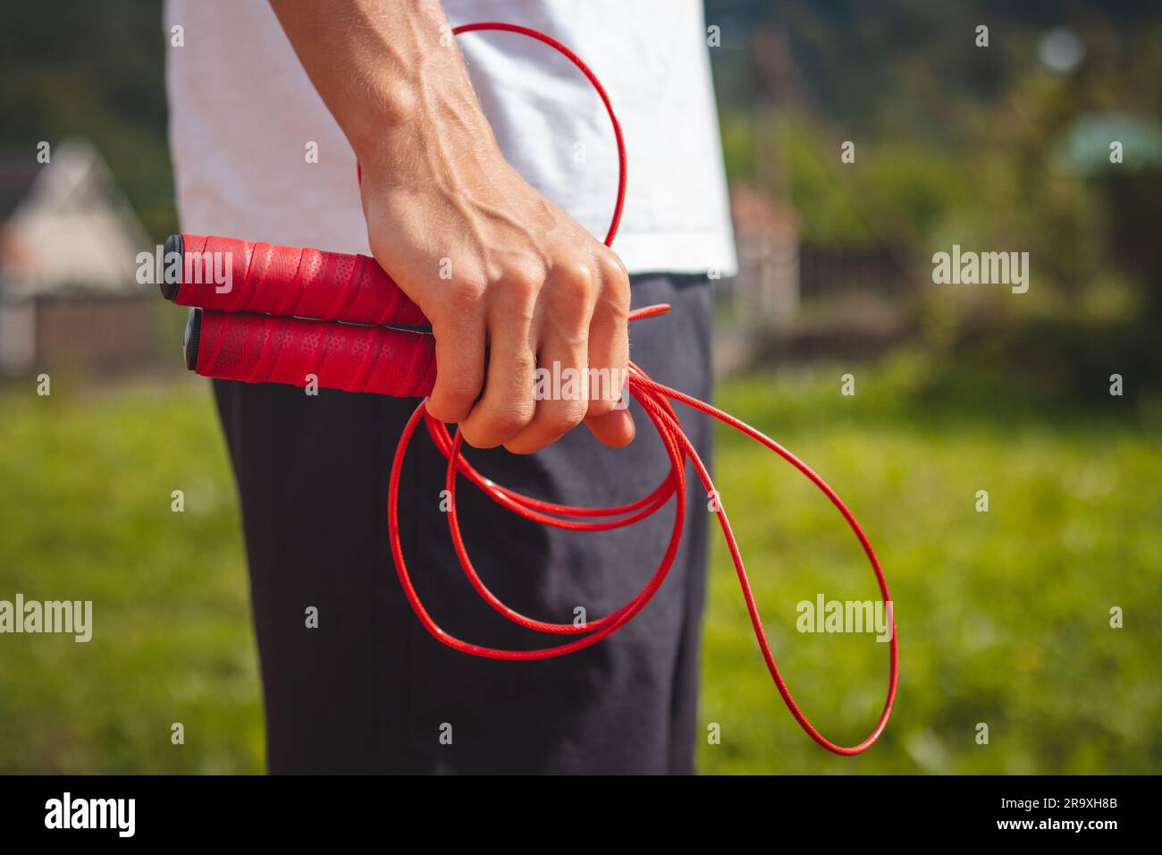 Brown-haired boy with an athletic build promotes the jump rope as one ...