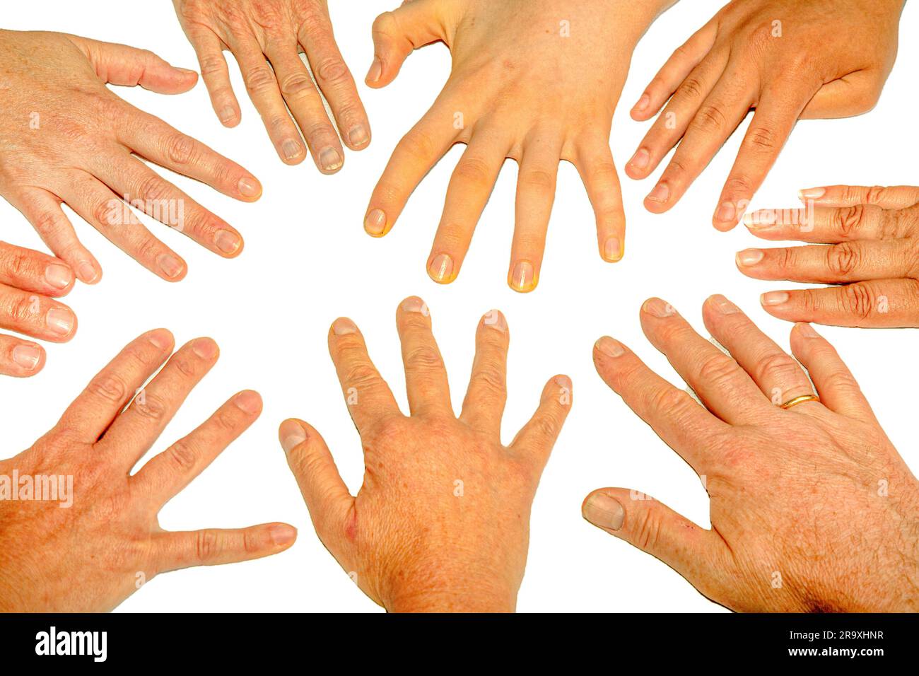 many hands on a table isolated on white Stock Photo - Alamy