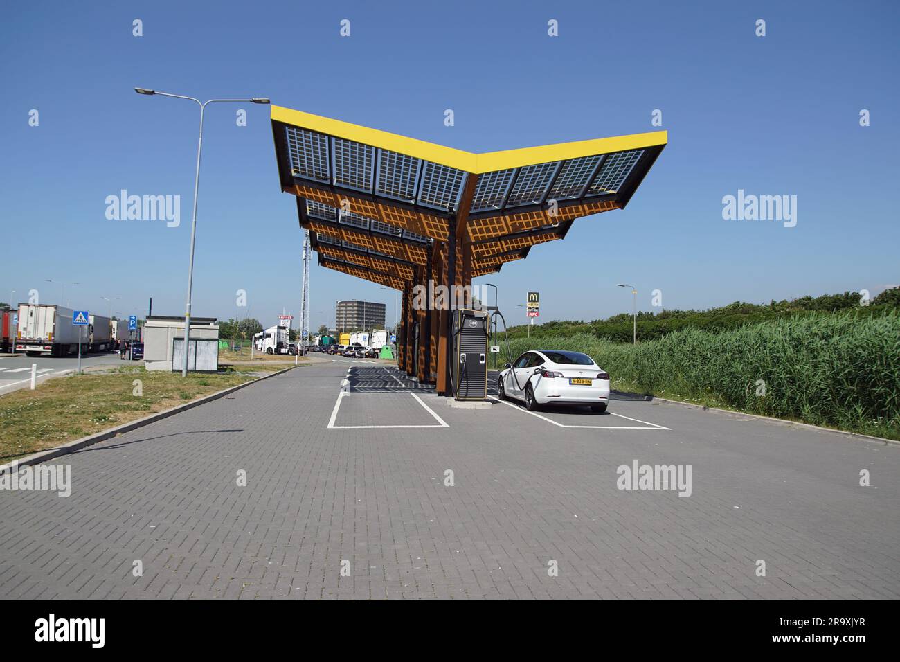 Fastned charging station, charge point with electric car on rest area ...