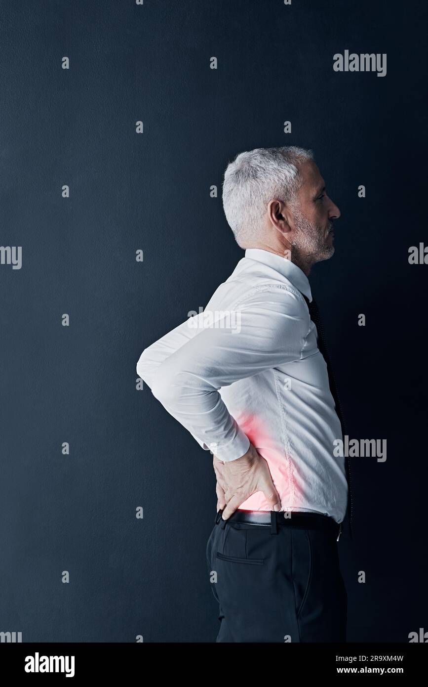 Injury, feeling and a businessman with back pain at work, spine problem ...