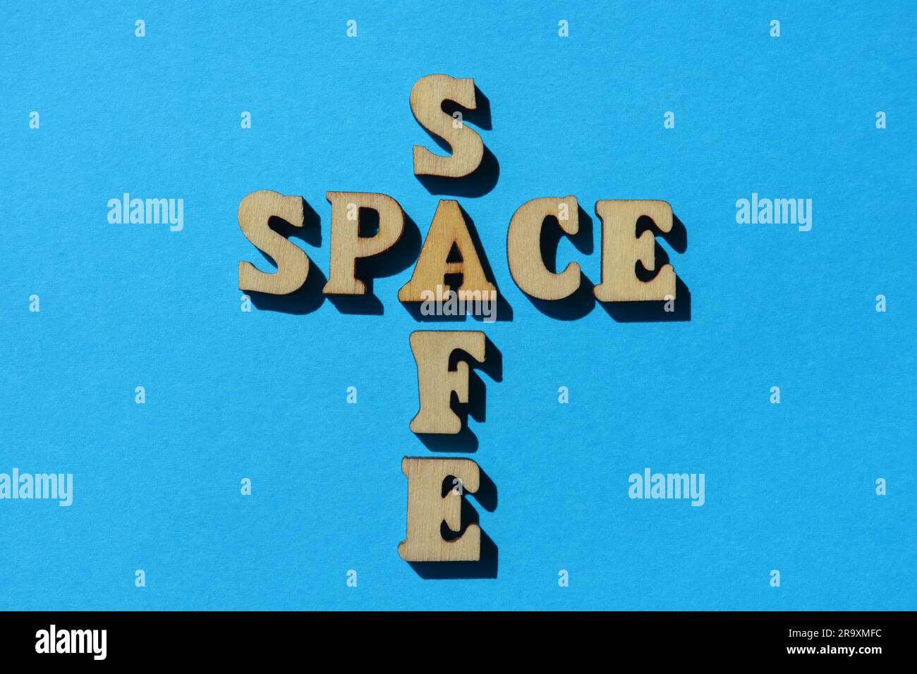 Safe Space, words in wooden alphabet letters in crossword form isolated ...