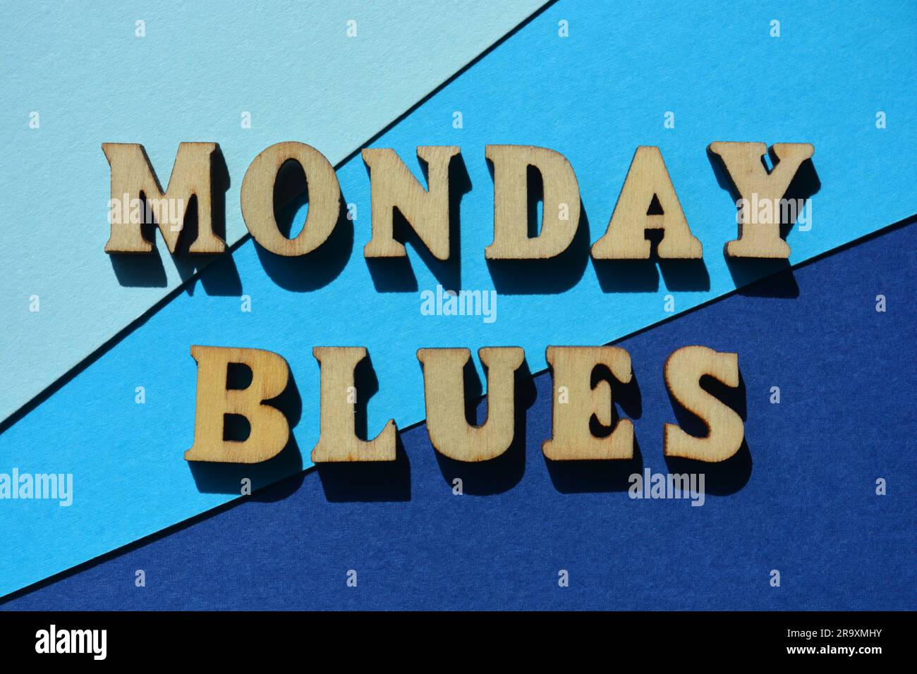 Monday Blues, words in wooden alphabet letters isolated on blue ...