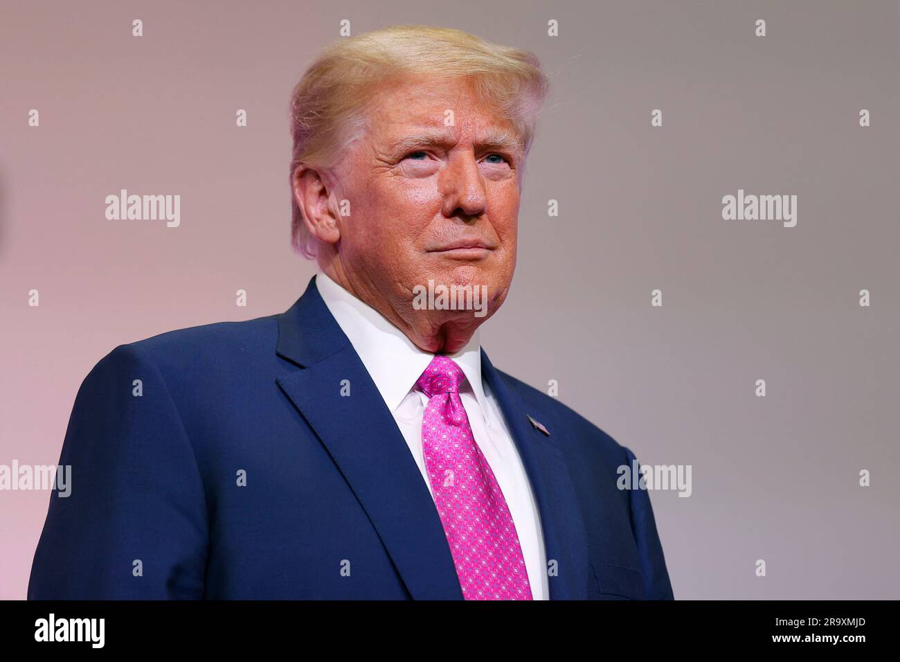 FILE - Former President Donald Trump stands on stage before speaking at ...