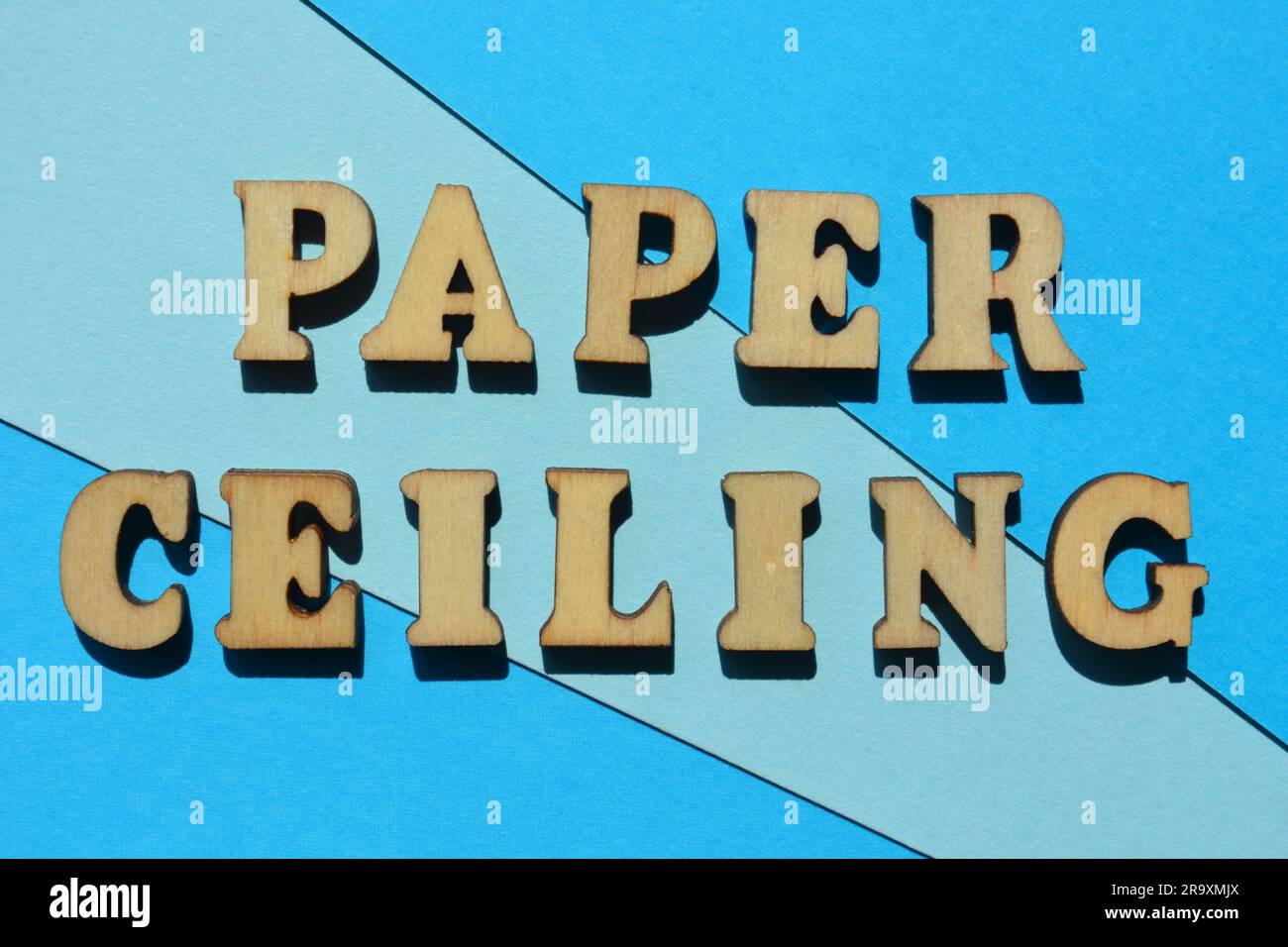 Paper Ceiling, words in wooden alphabet letters isolated on background ...