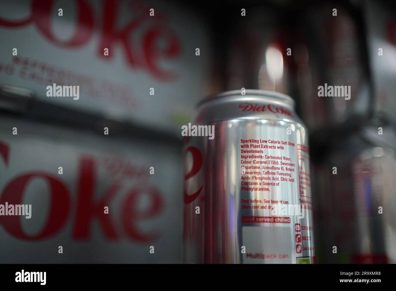 Cans of Diet Coke in a supermarket, as an artificial sweetener commonly ...