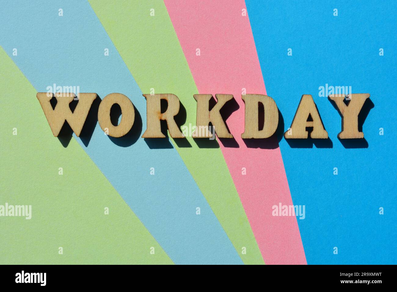 Workday, word in wooden alphabet letters isolated on background as ...