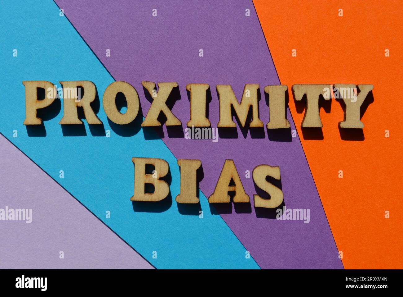 Proximity Bias, words in wooden alphabet letters isolated on colourful ...