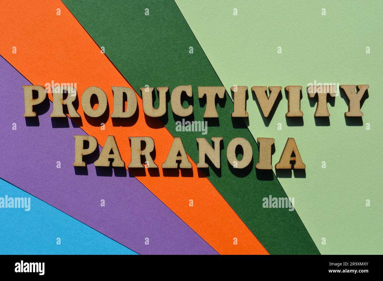 Productivity Paranoia, words in wooden alphabet letters isolated on ...
